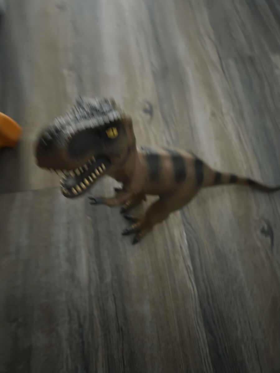 Tyrannosaurus REX 13 inches H x 20Inches L This is a Rubber Dinosaur ...