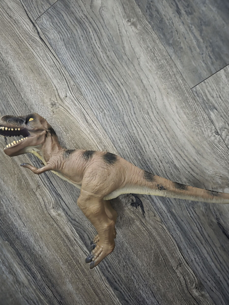 Tyrannosaurus REX 13 inches H x 20Inches L This is a Rubber Dinosaur ...